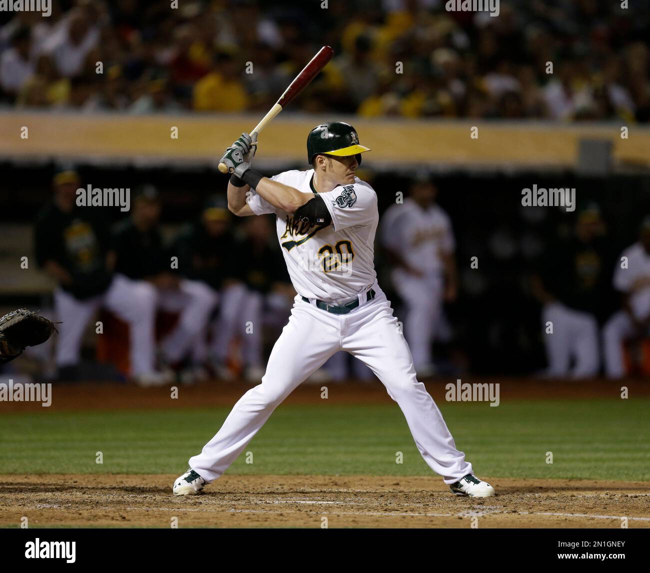 Oakland Athletics' Mark Canha, right, at bat against Houston Astros ...