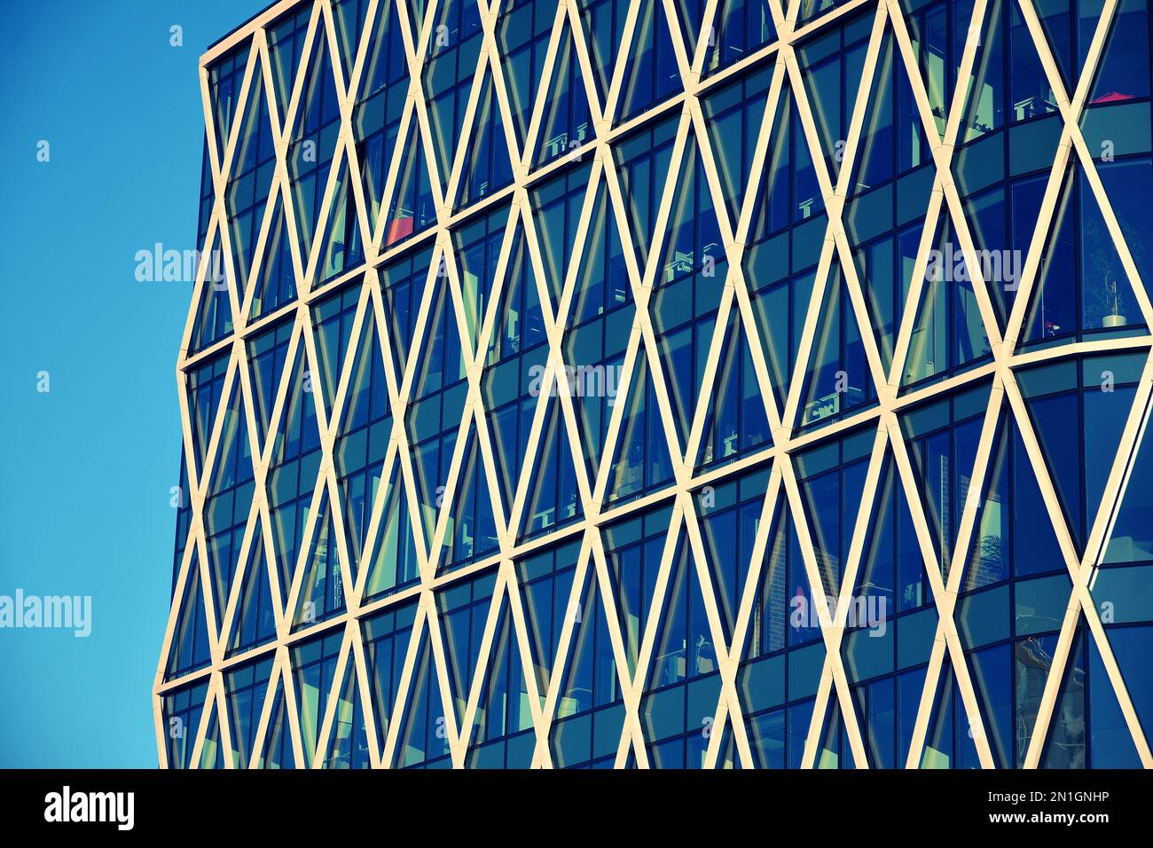 Modern office building on a clear sky background. Retro stylized ...