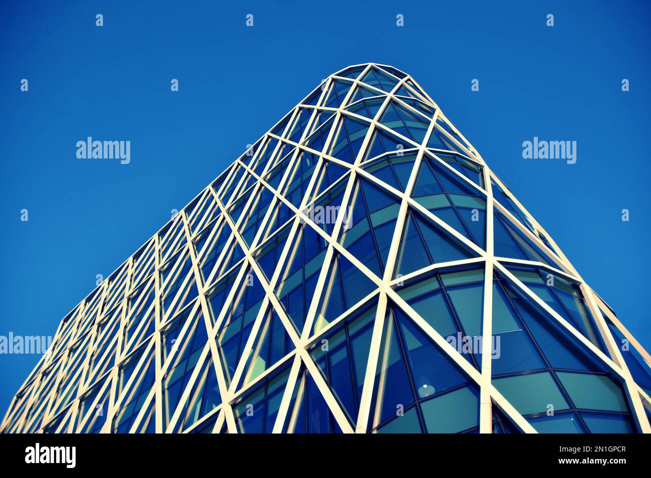 Modern office building on a clear sky background. Retro stylized ...