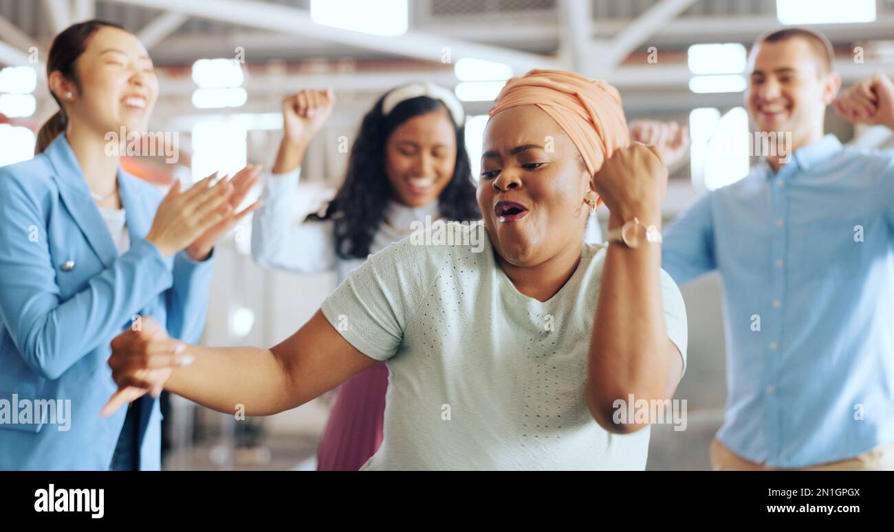 Creative business people, dancing and celebration at office for ...