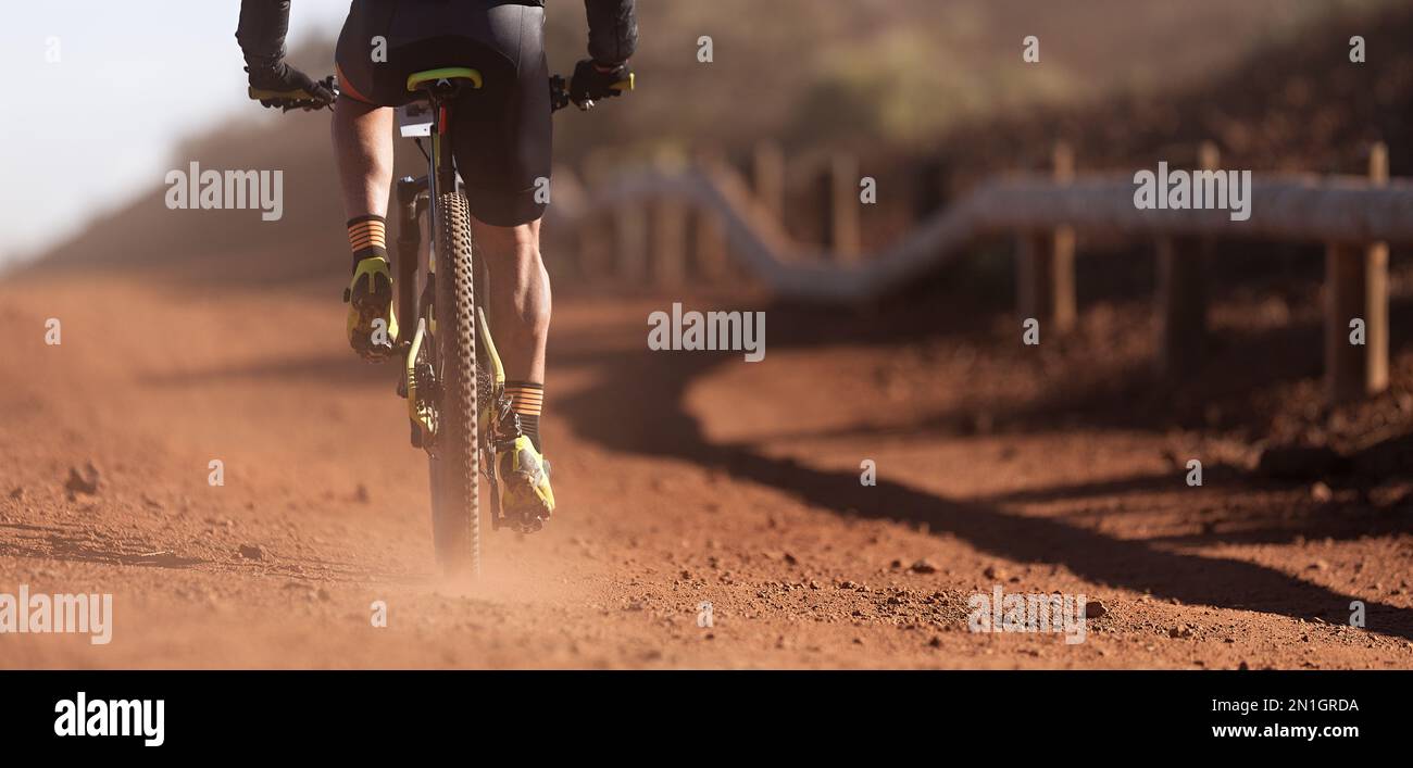 Back view cyclist riding on hi-res stock photography and images - Alamy