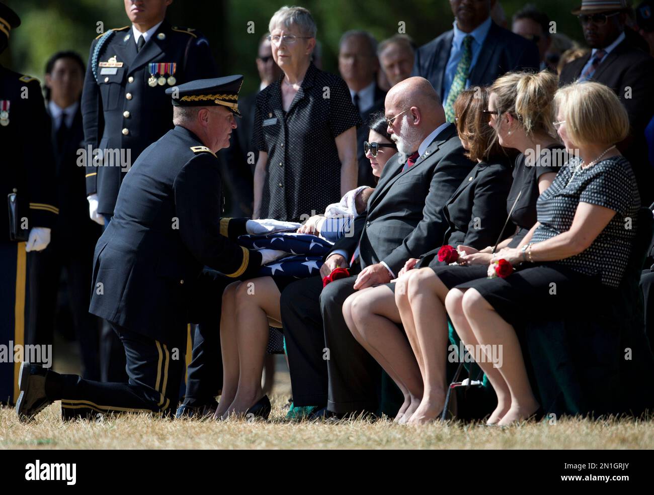 Maj. Gen. Glenn Curtis of the Louisiana National Guard, left, presents ...