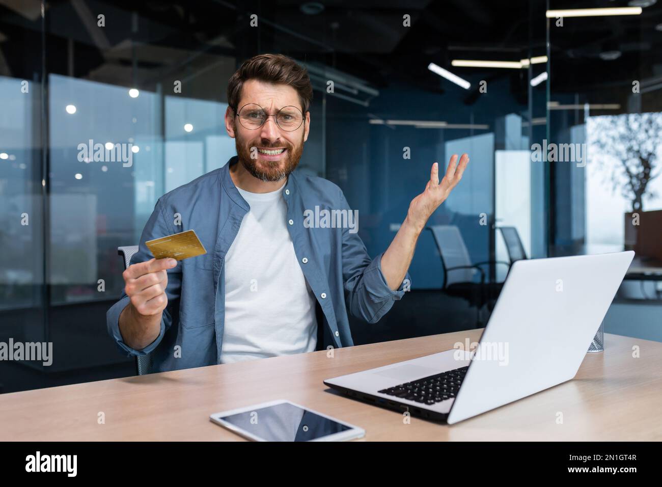 Angry hacker using credit card hi-res stock photography and images - Alamy