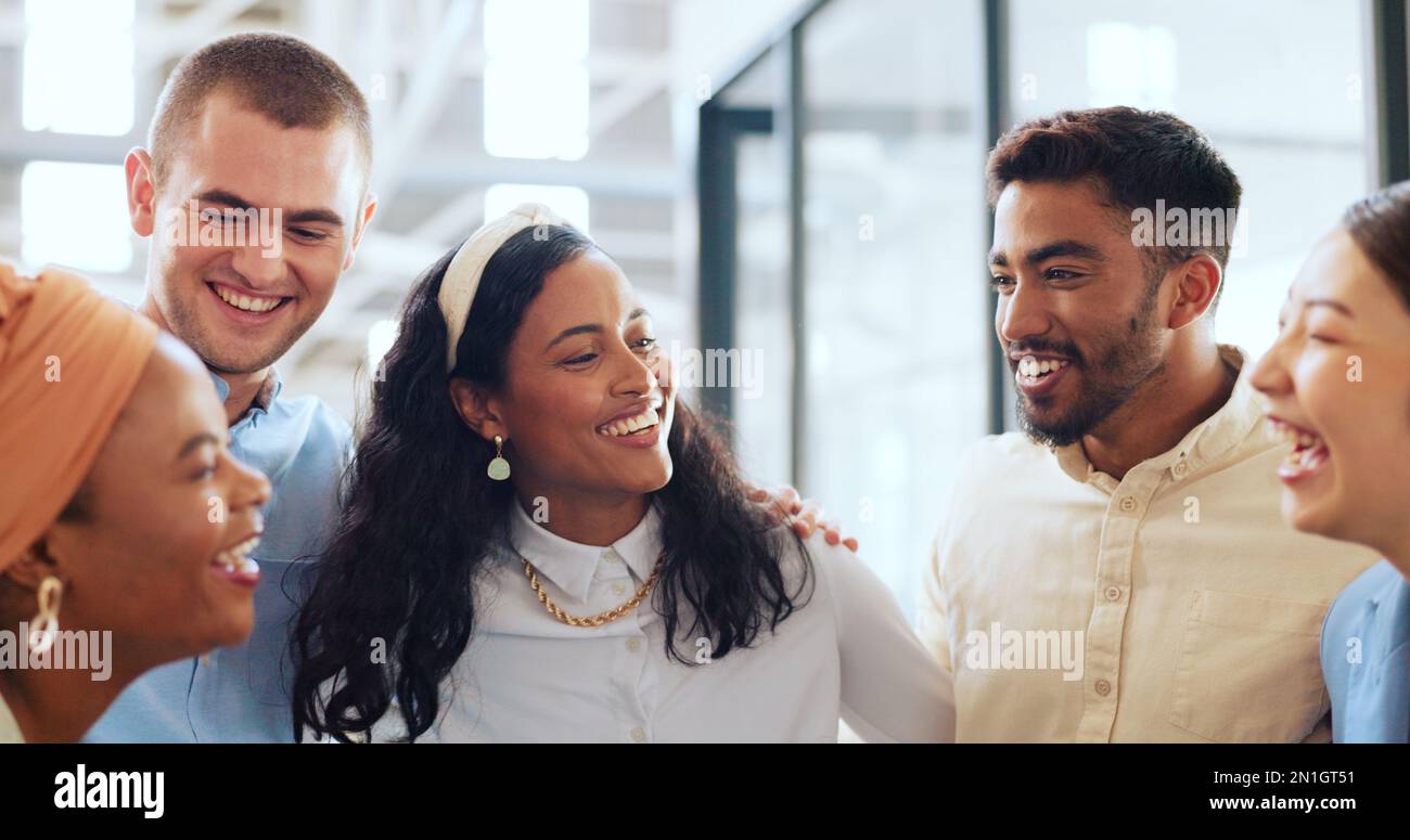 Office, diversity and business people hug for team building, teamwork ...