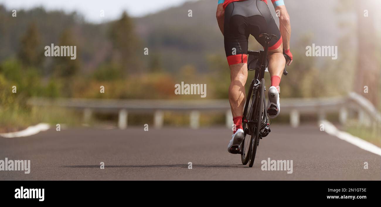 Road bike cyclist man cycling, athlete on a race cycle Stock Photo - Alamy
