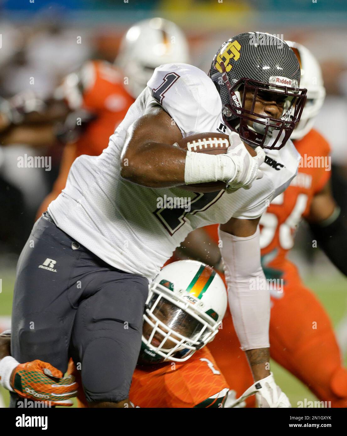Bethune Cookman running back Anthony Jordan (1) is tackled by Miami ...