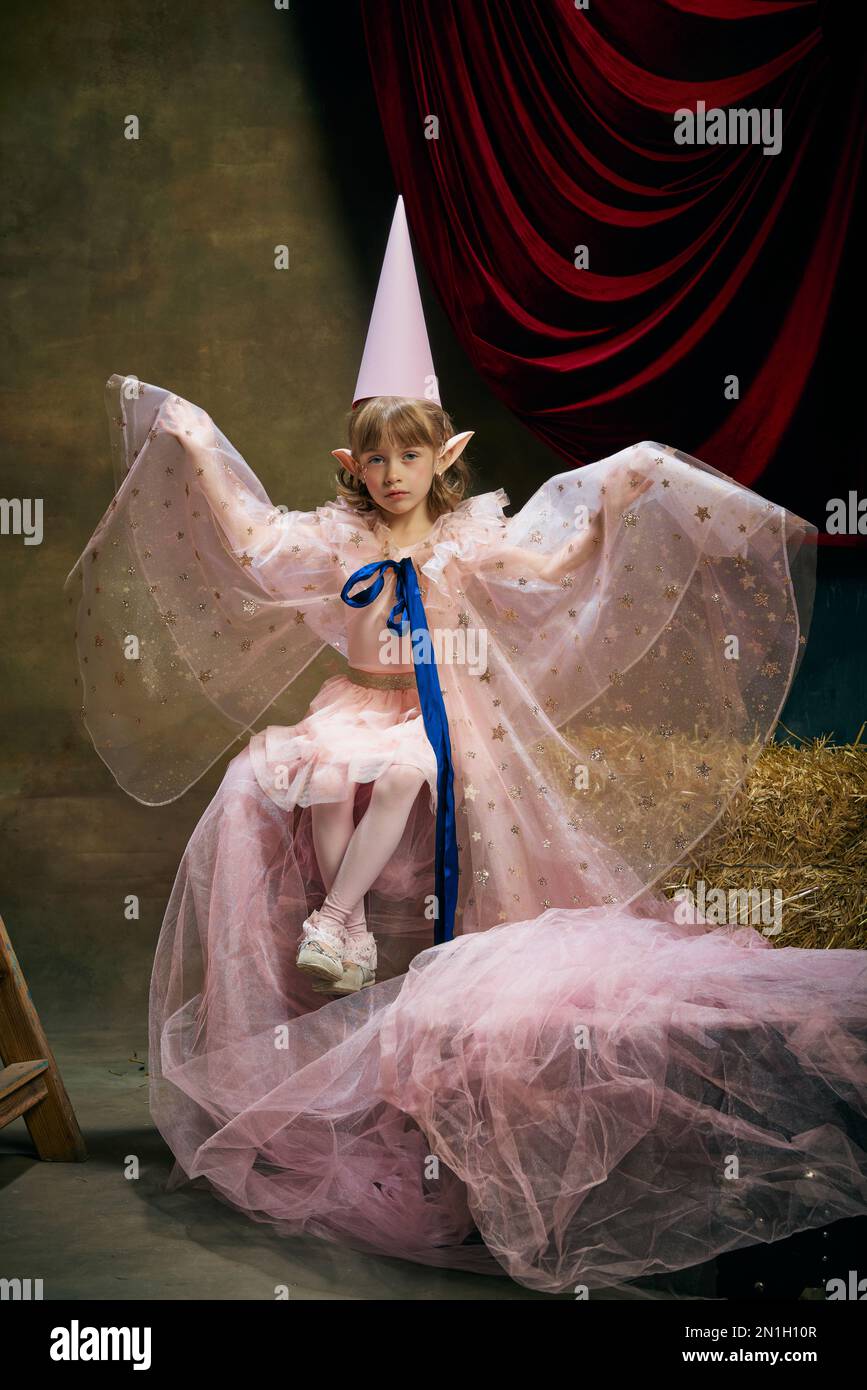 Beautiful, cute, little girl in image of magic fairy elf posing in ...