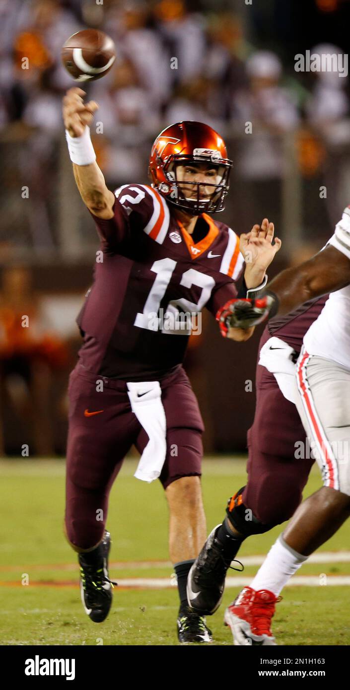 Virginia Tech quarterback Michael Brewer (12) throws the ball during ...