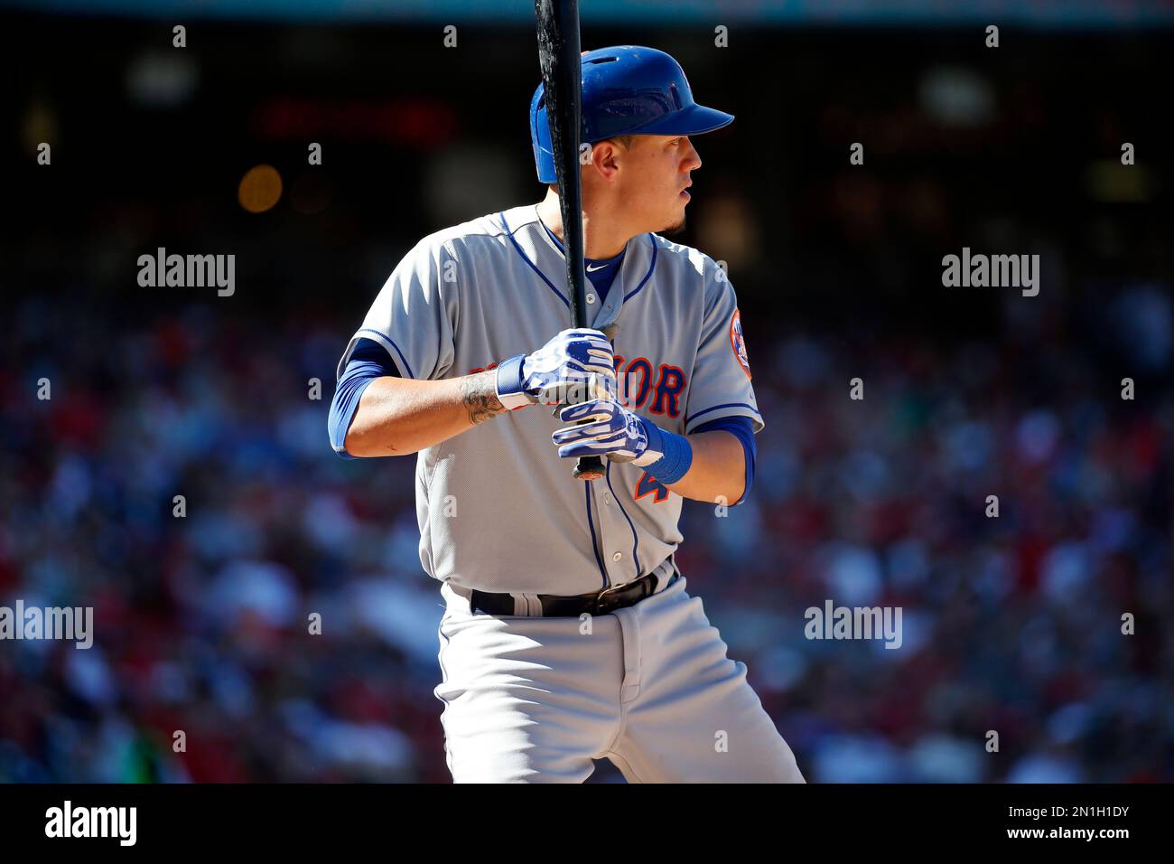 New York Mets shortstop Wilmer Flores (4) bats during a baseball game ...
