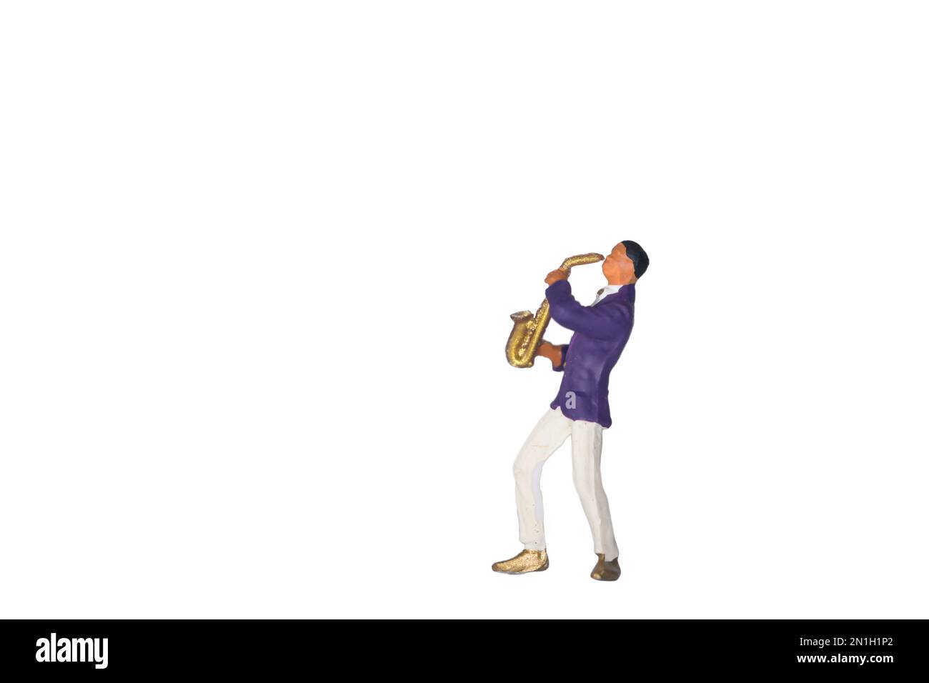 musician playing saxophone isolated on white background, side view ...