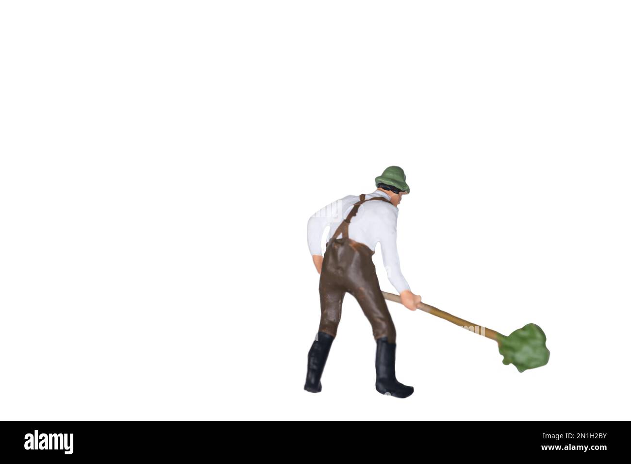 Farmer with a pitchfork isolated on white background, rear view Stock ...