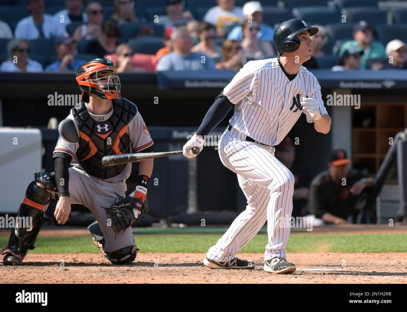 New York Yankees' Greg Bird, right, hits a three-run home run as ...