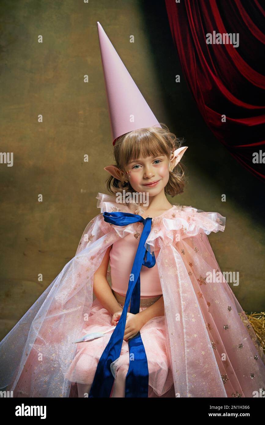 Beautiful, cute, little girl in image of magic fairy elf posing in ...