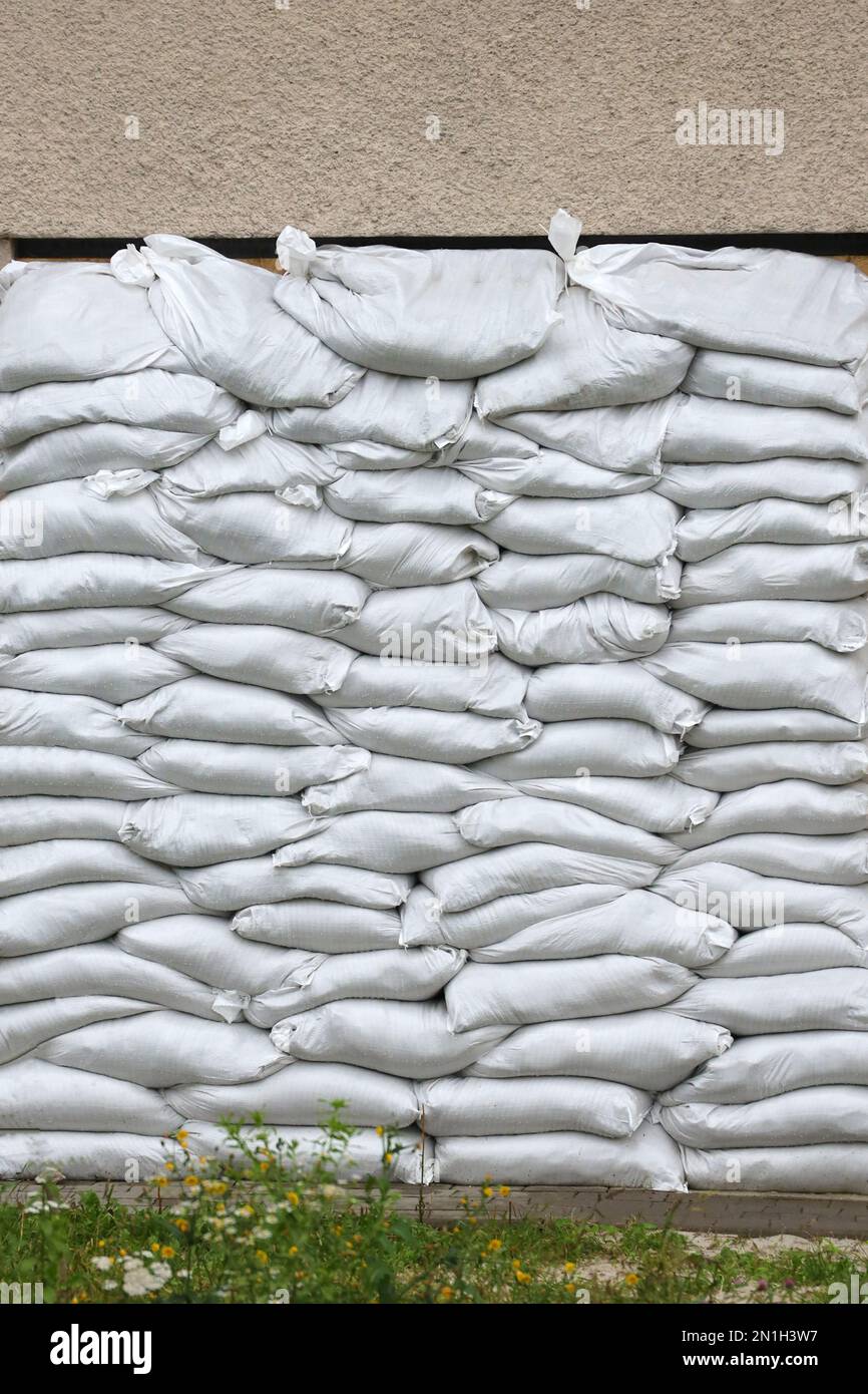 Texture of barricade wall made of white sandbags for war purposes ...