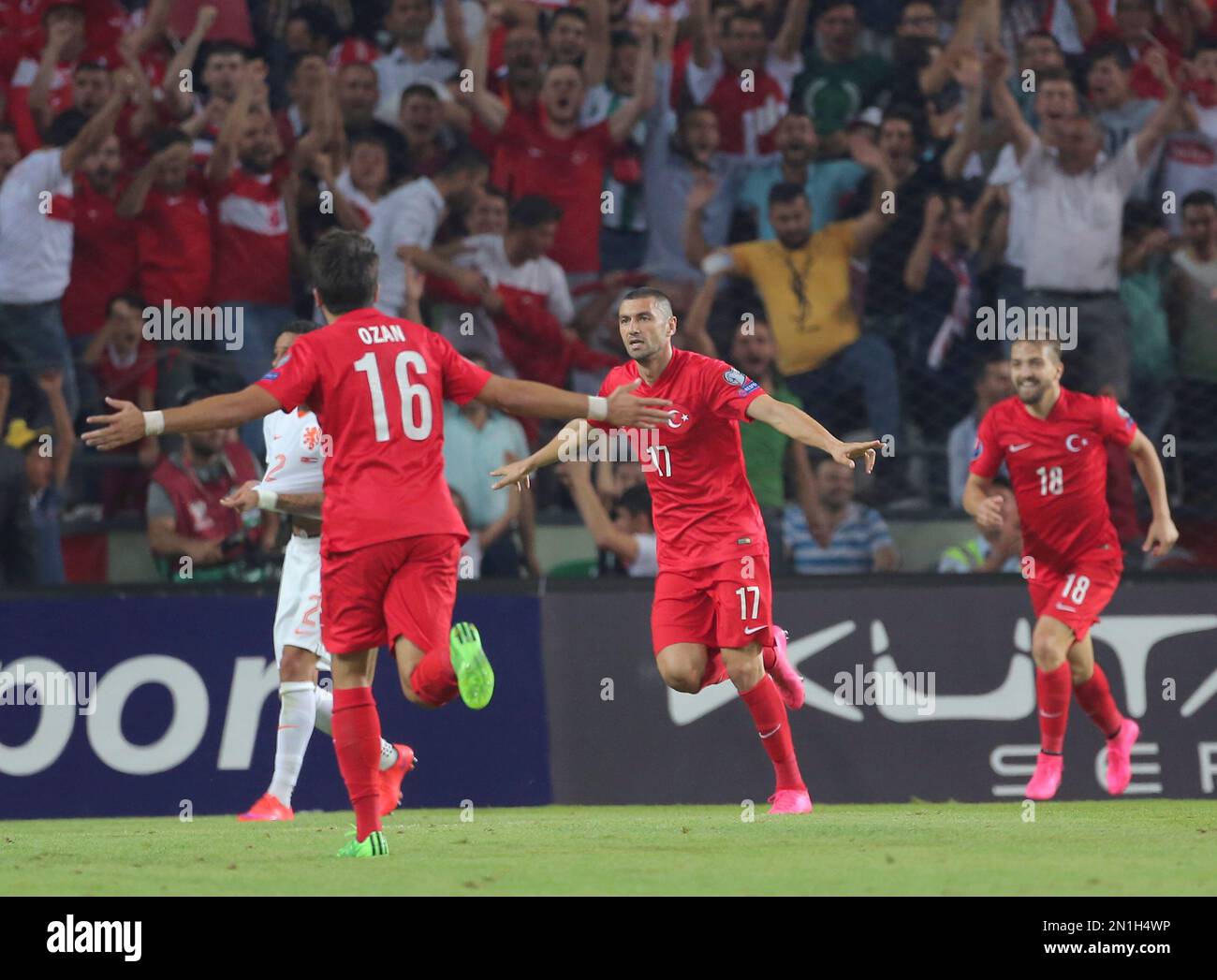 Turkish soccer players celebrate their 3-0 victory over the Netherlands ...