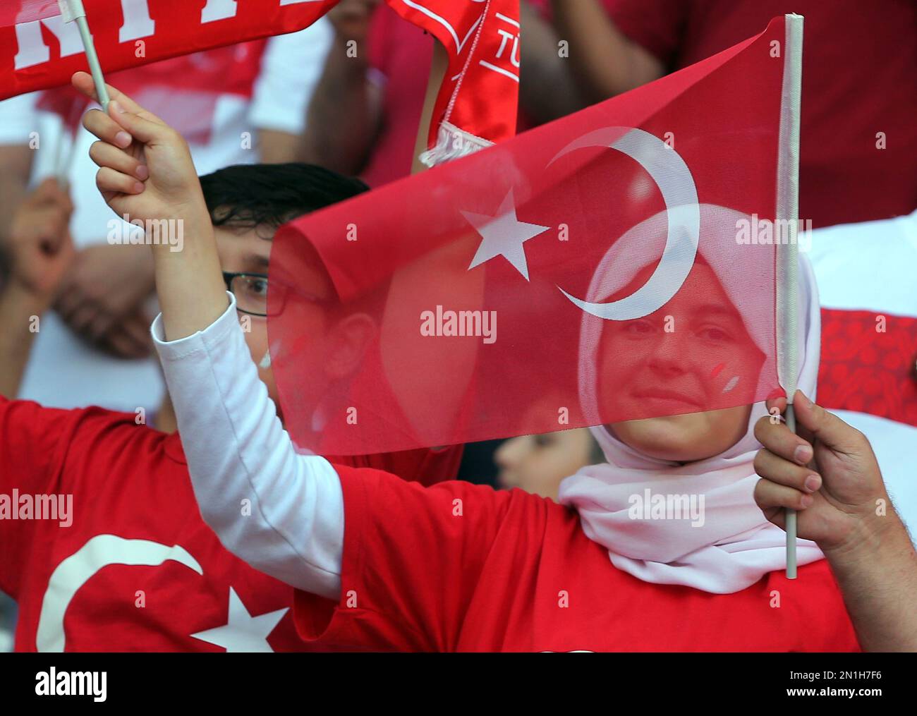 Turkey's supporters waves their national flags during their Euro 2016 ...