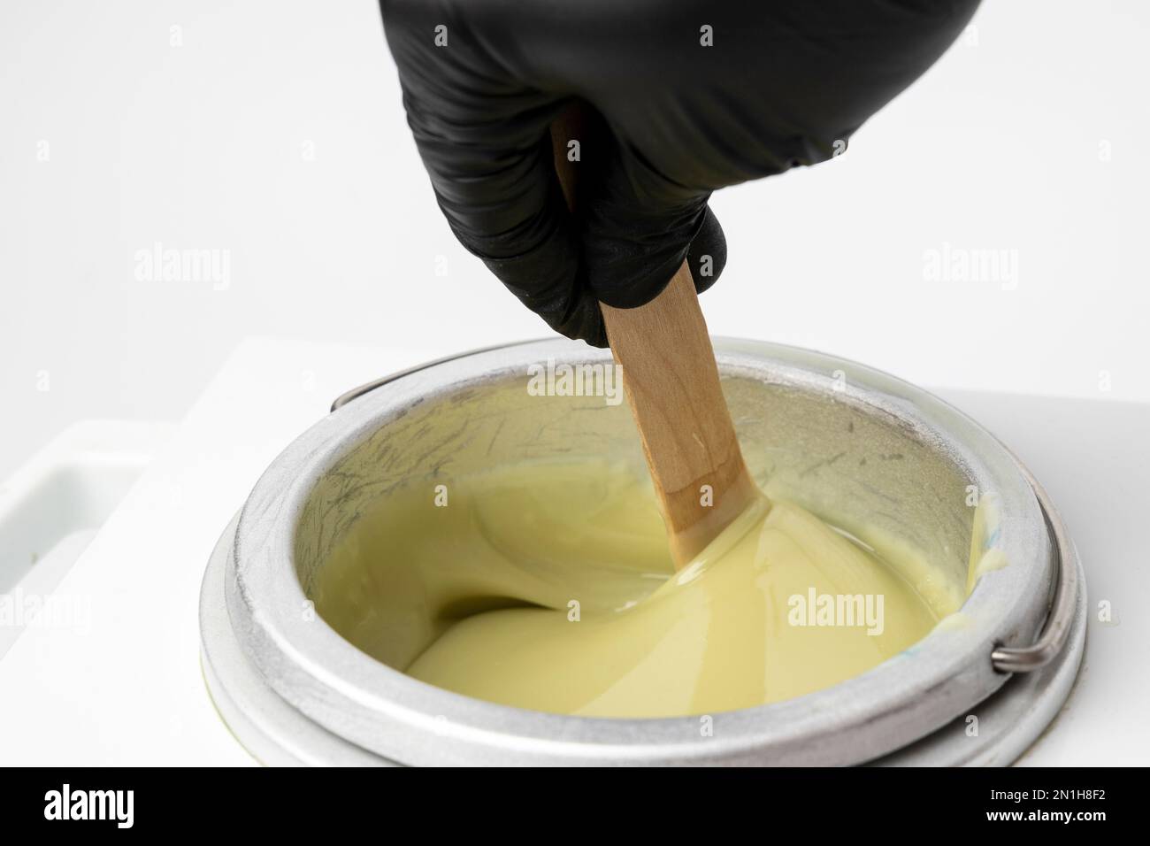Wax melter hi-res stock photography and images - Alamy