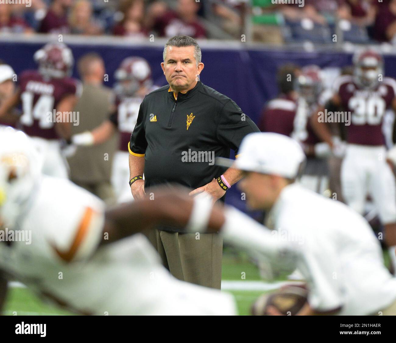 Arizona State head coach Todd Graham watches his team before an NCAA ...