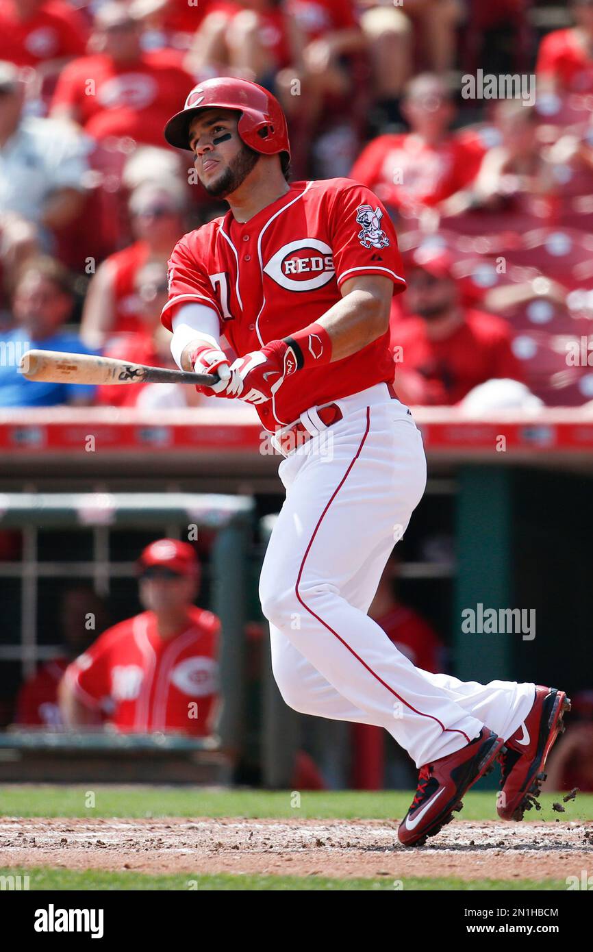 Cincinnati Reds' Eugenio Suarez hits a double off Milwaukee Brewers ...