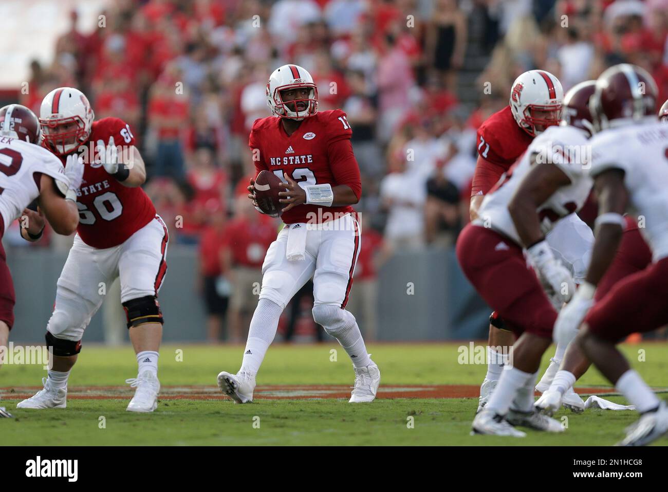 North Carolina State quarterback Jacoby Brissett looks to pass during ...