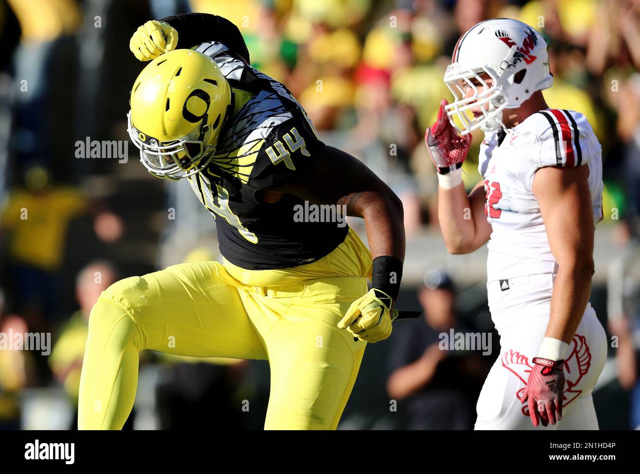 Oregon defensive lineman DeForest Buckner (44) pumps his fist after a ...
