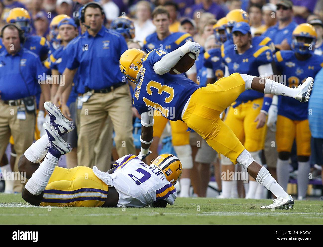 LSU cornerback Kevin Toliver II (2) tackles McNeese State quarterback ...