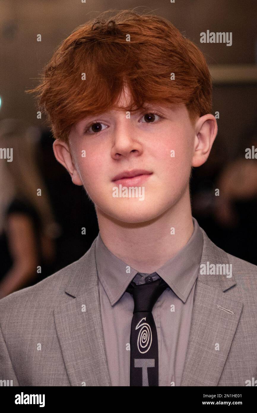 Gregory Mann poses for photographers upon arrival at the Critics' Circle Film Awards in London ...