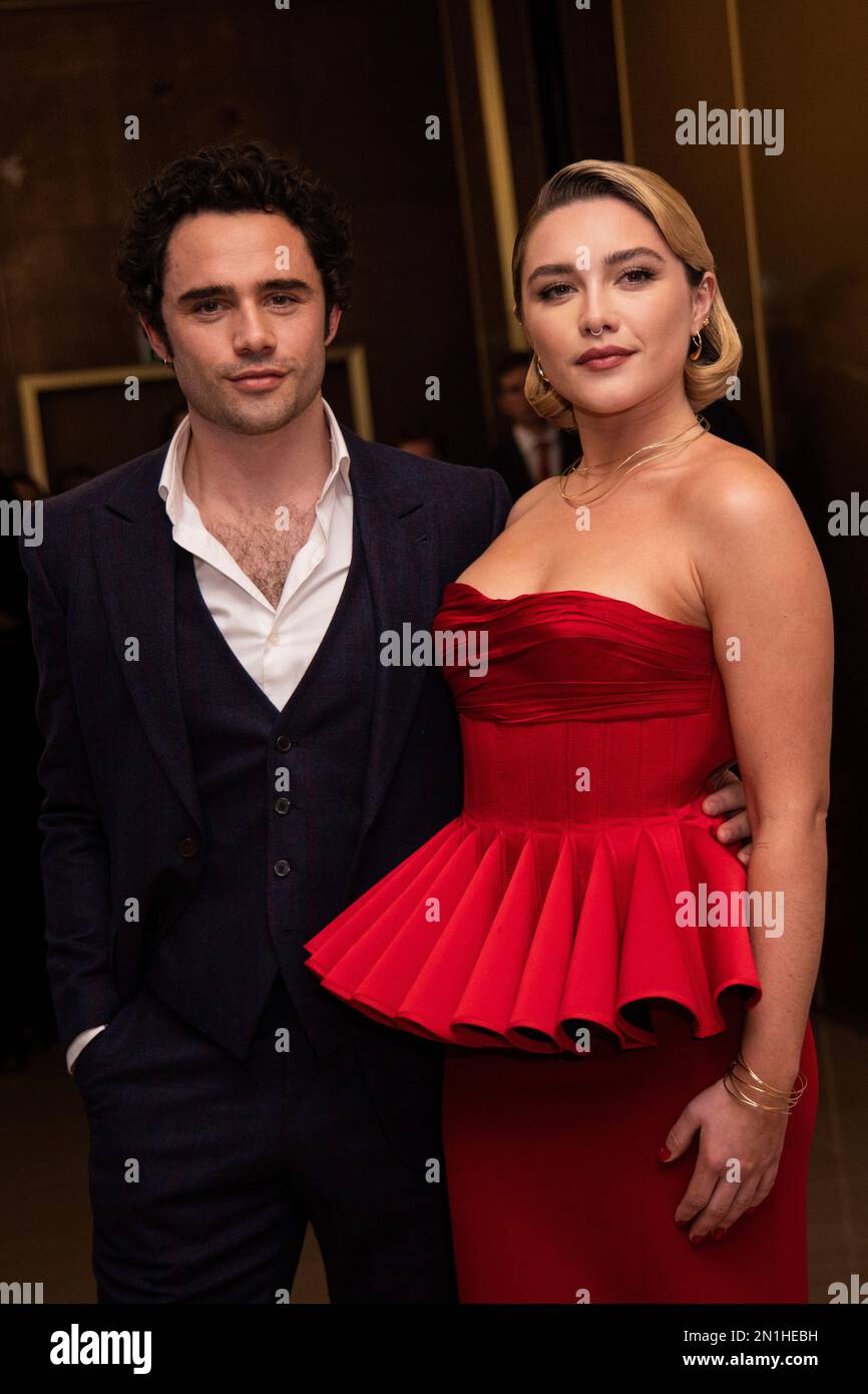 Toby Sebastian and Florence Pugh pose for photographers upon arrival at ...