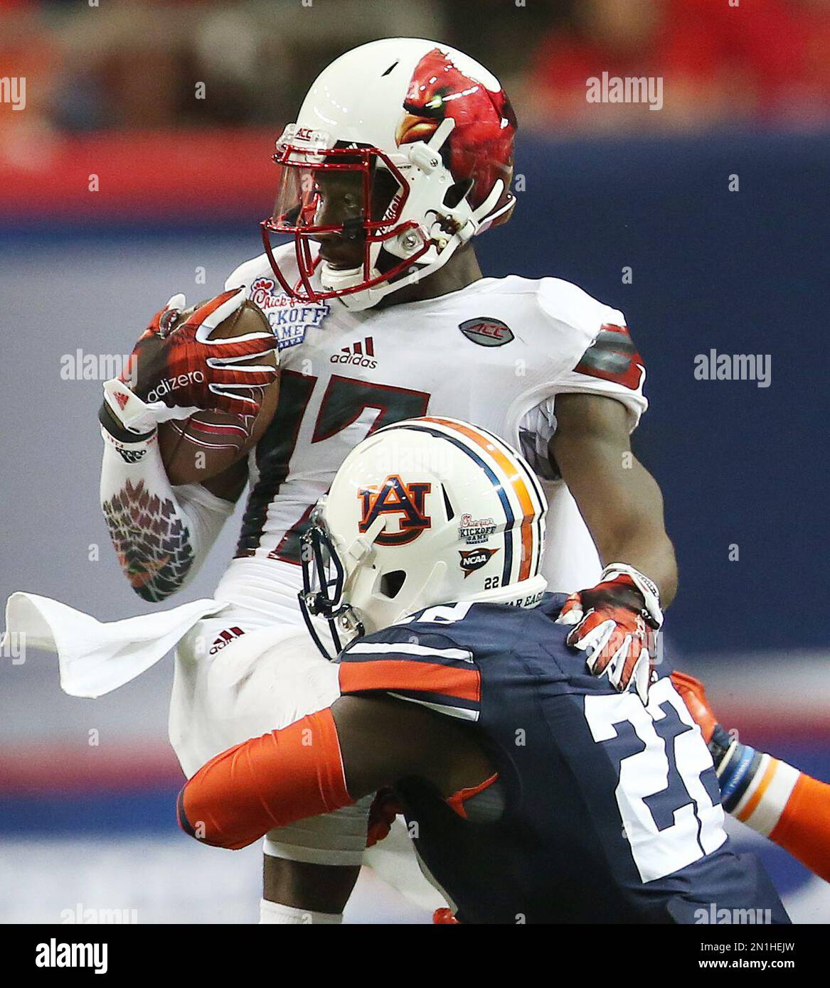 Louisville wide receiver James Quick (17) makes the catch against ...
