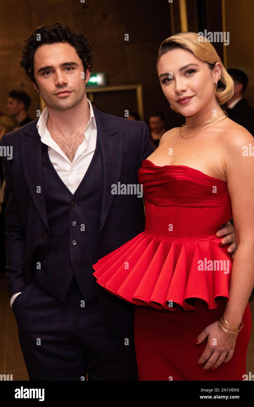 Toby Sebastian and Florence Pugh pose for photographers upon arrival at ...