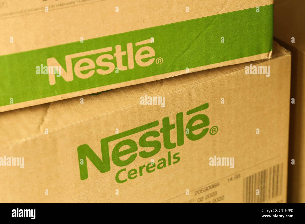 KYIV, UKRAINE - MAY 4, 2022 Big cardboard boxes with logo of Nestle ...
