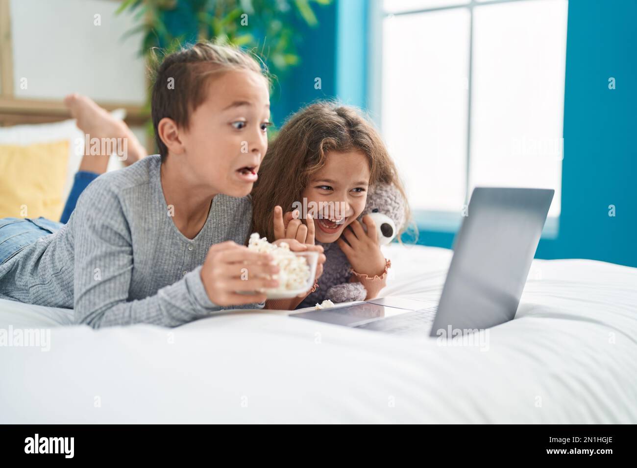 Two kids watching scary movie hi-res stock photography and images - Alamy