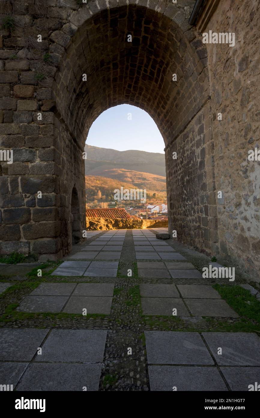 vertical stone arch with landscape in the background, Hervas Stock ...