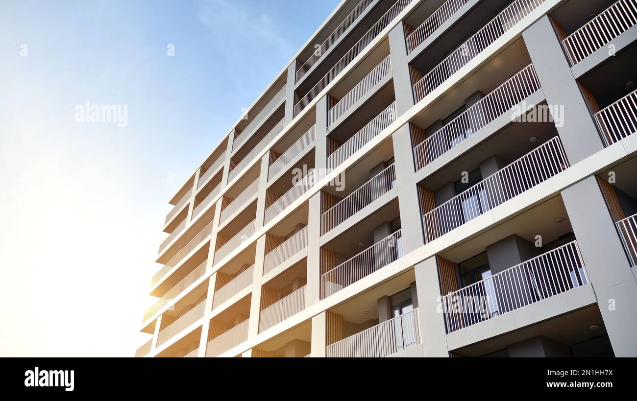 Condominium and apartment building with symmetrical modern architecture ...