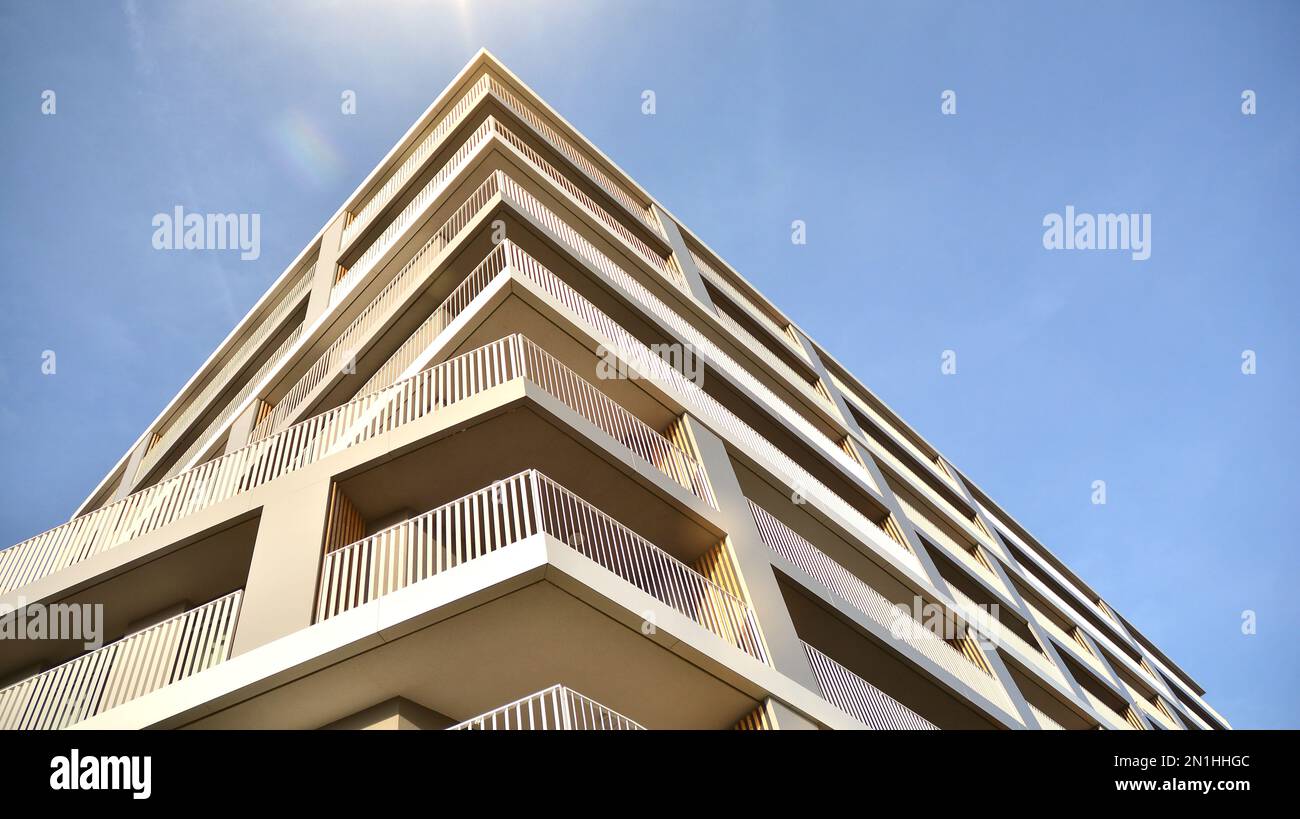 Condominium and apartment building with symmetrical modern architecture ...