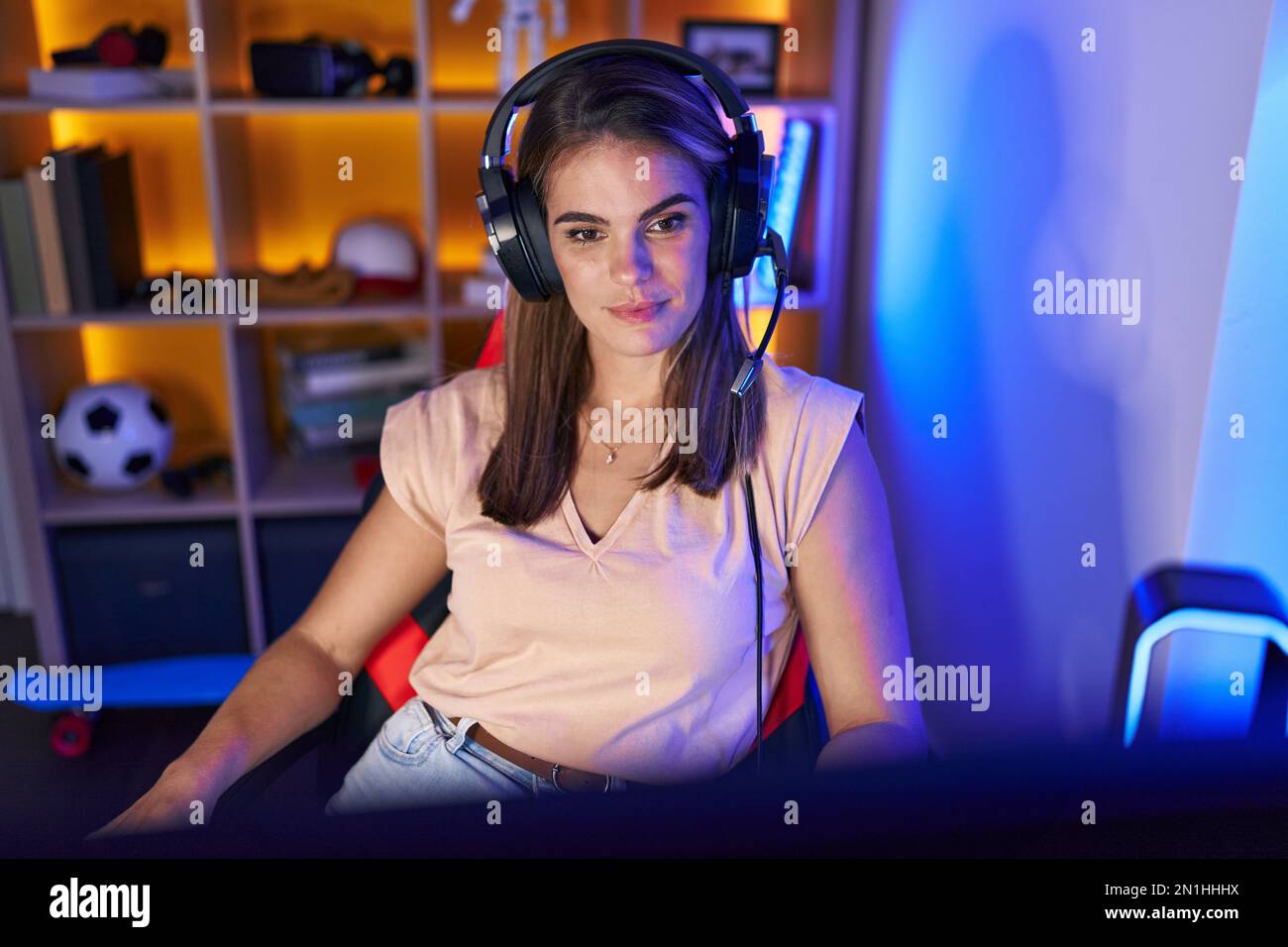 Young beautiful hispanic woman streamer smiling confident sitting on ...