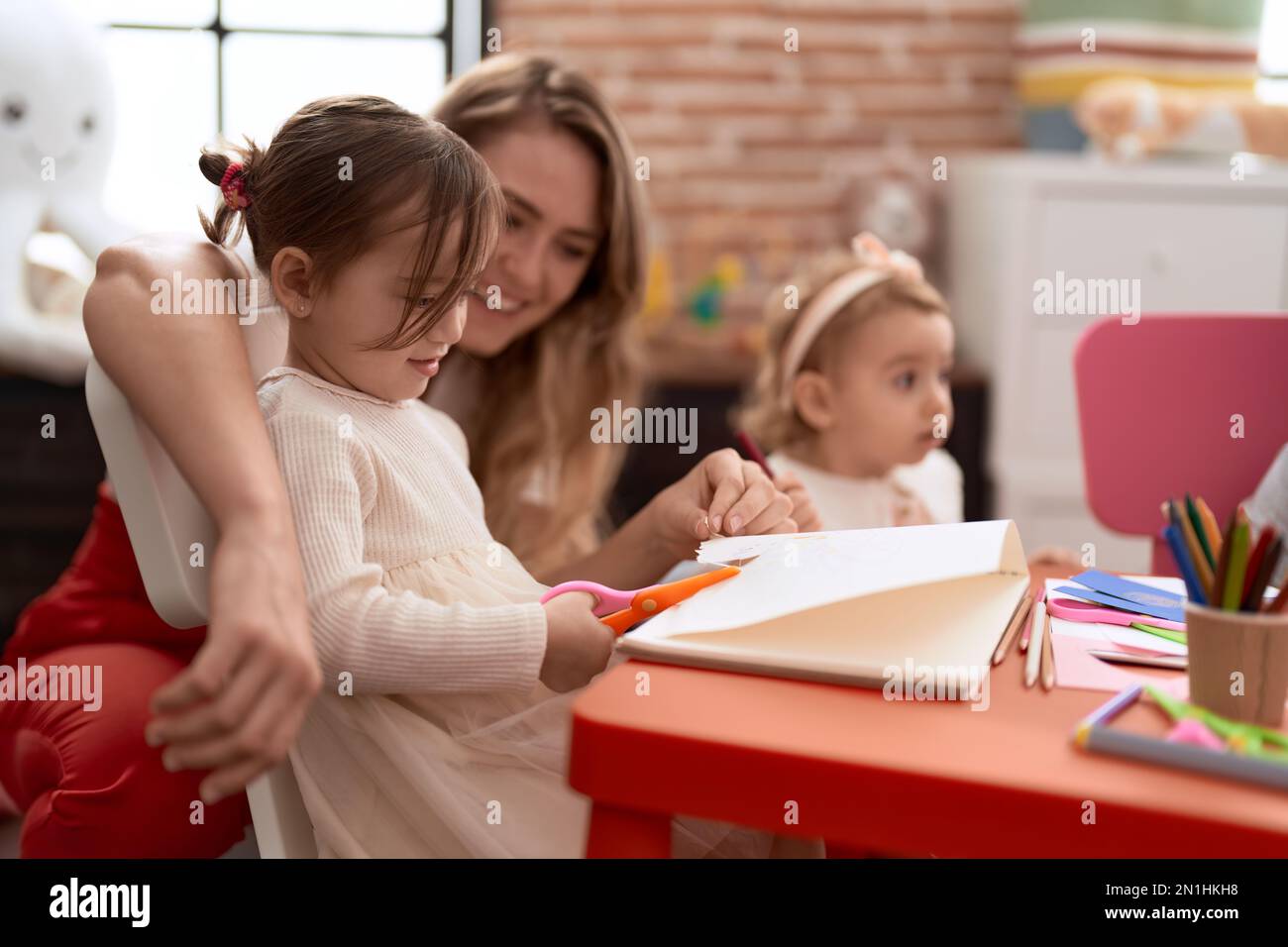 Teacher paperwork with child hi-res stock photography and images - Alamy