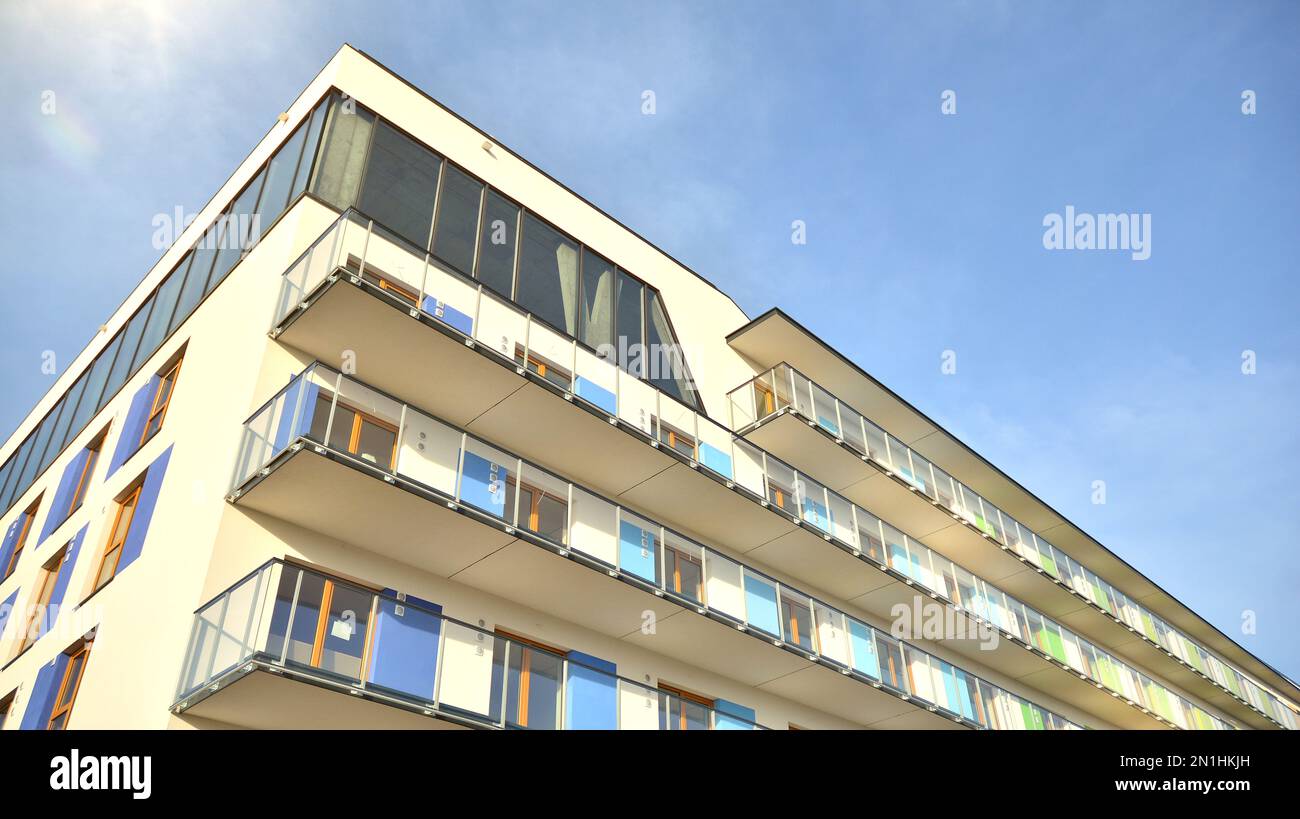 Condominium and apartment building with symmetrical modern architecture ...