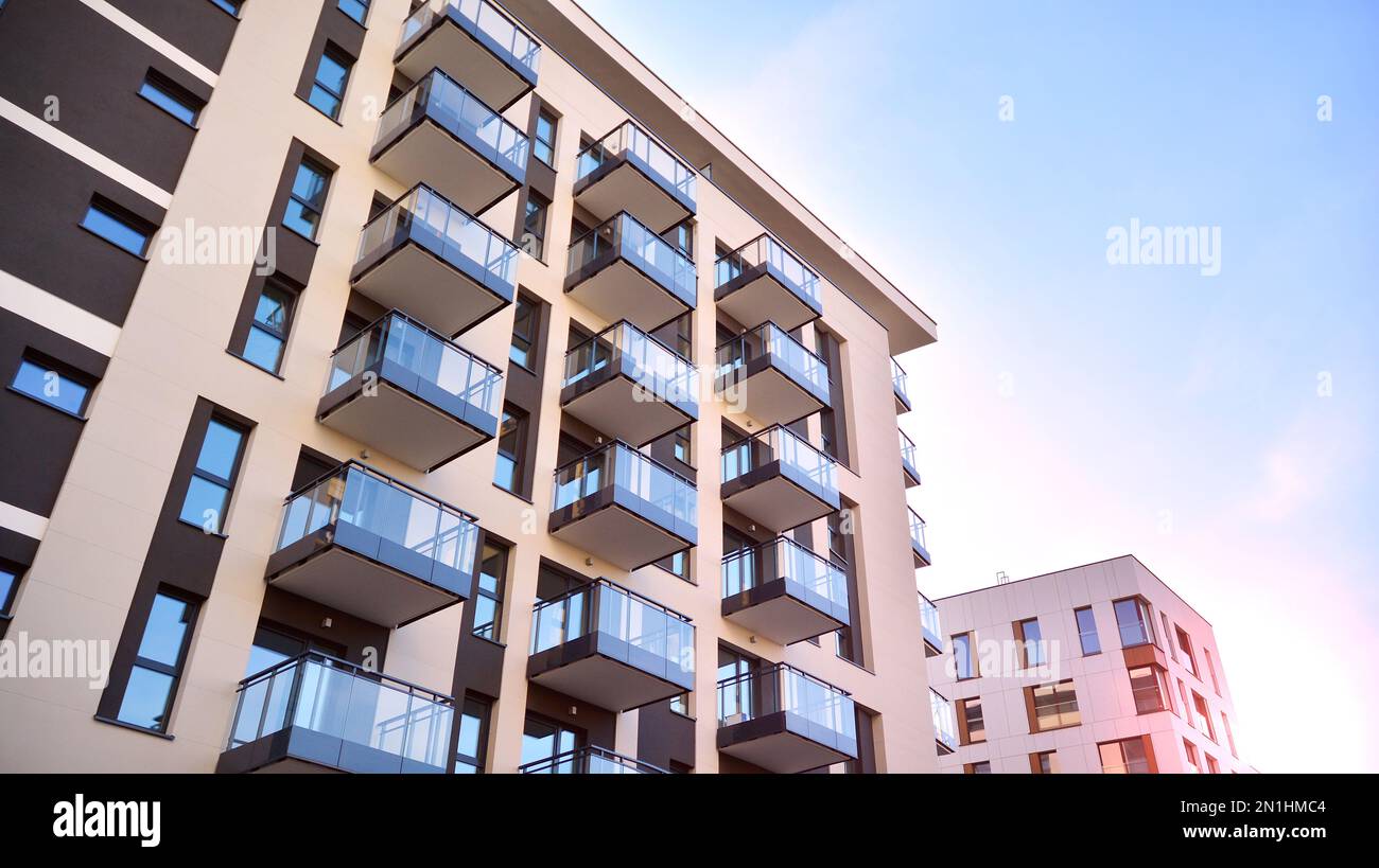 Condominium and apartment building with symmetrical modern architecture ...