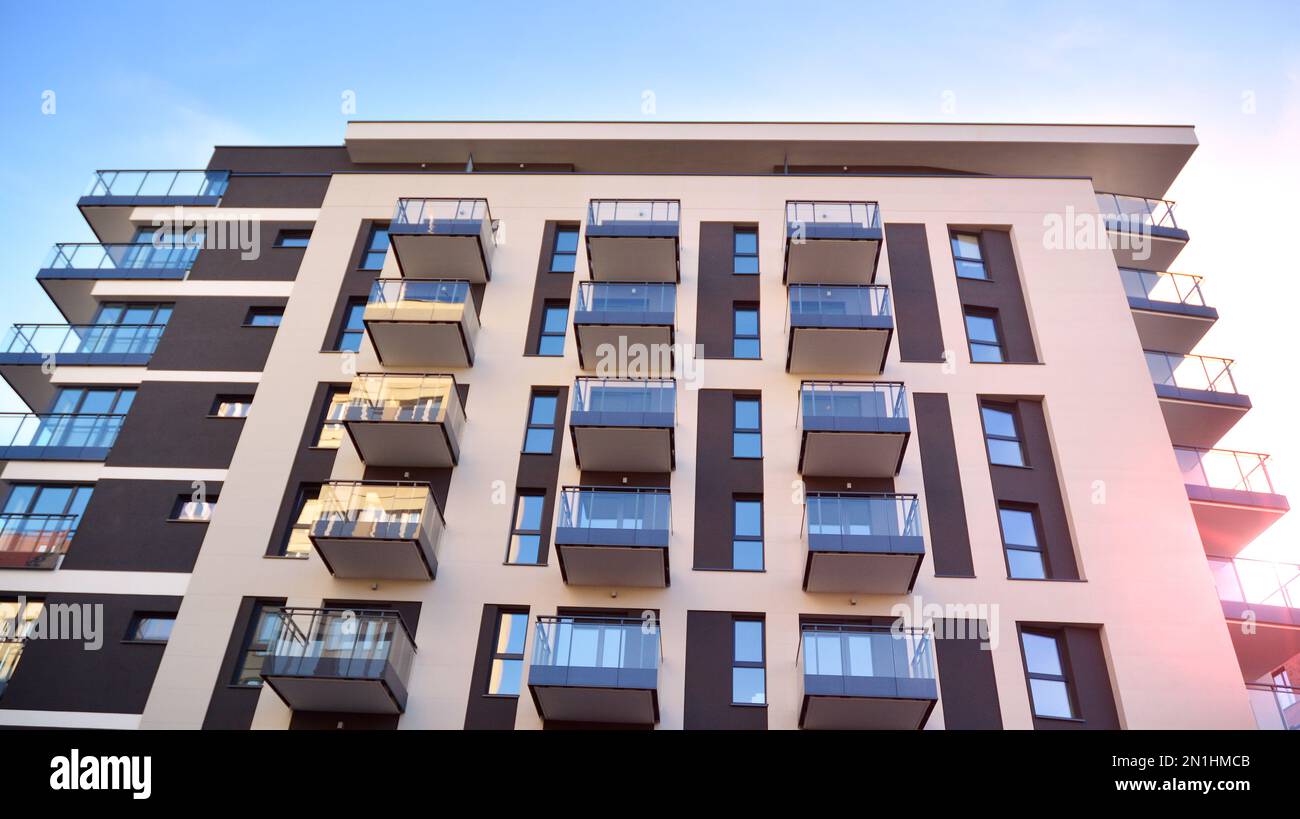 Condominium and apartment building with symmetrical modern architecture ...