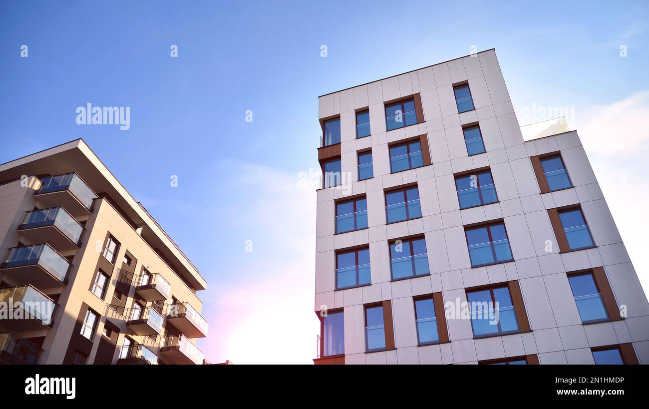 Condominium and apartment building with symmetrical modern architecture ...