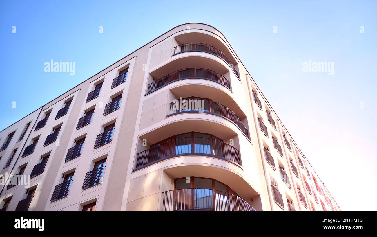 Condominium and apartment building with symmetrical modern architecture ...