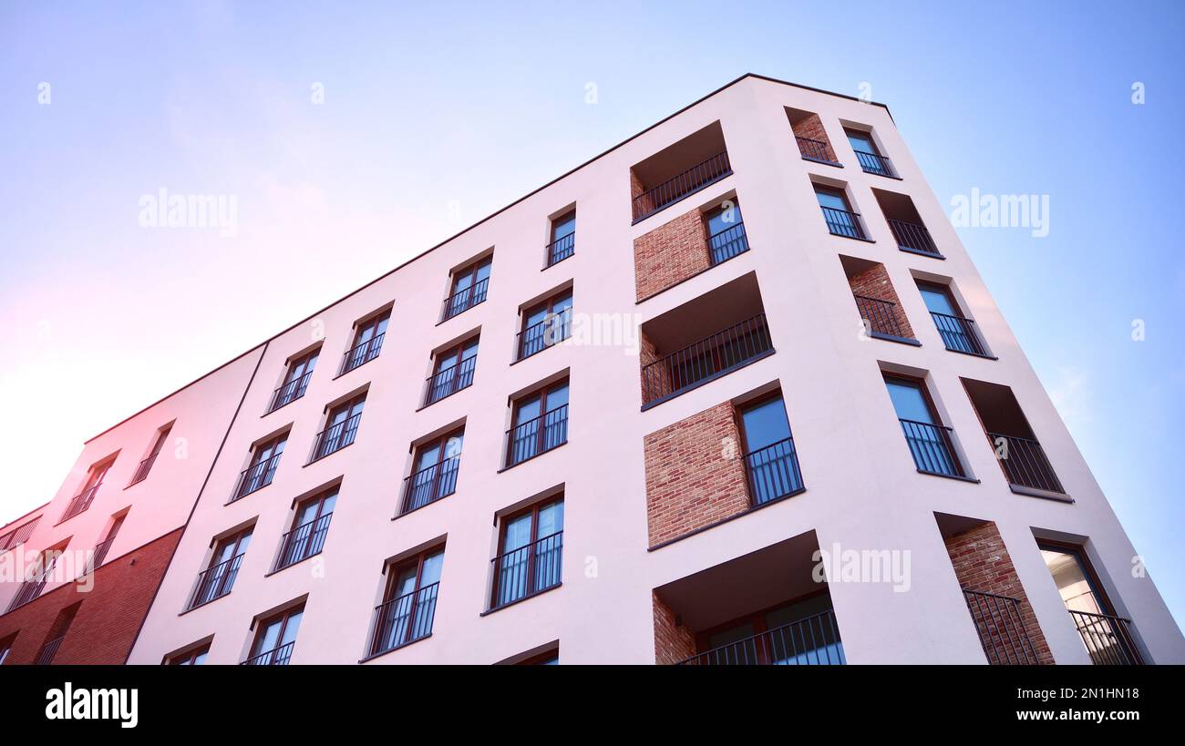 Condominium and apartment building with symmetrical modern architecture ...