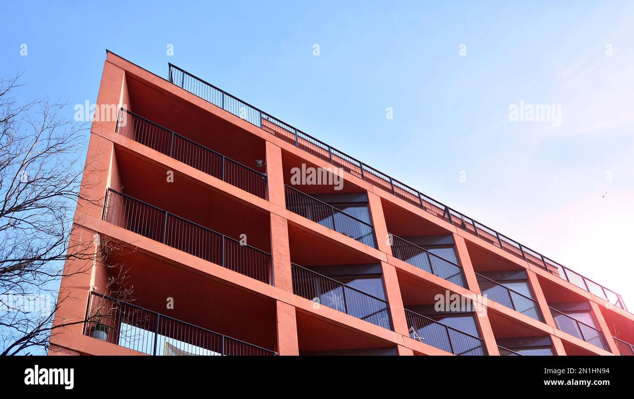 Condominium and apartment building with symmetrical modern architecture ...