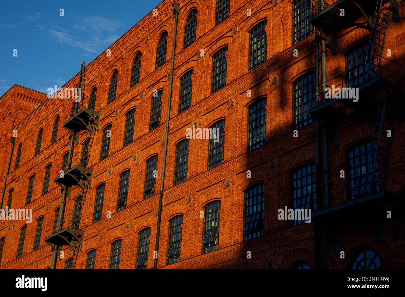 Red brick facade of the factory Stock Photo - Alamy