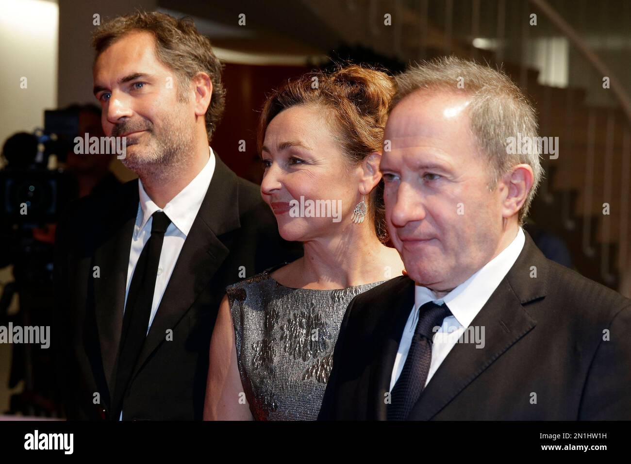 From left, director Xavier Giannoli and actors Catherine Frot and Andre ...