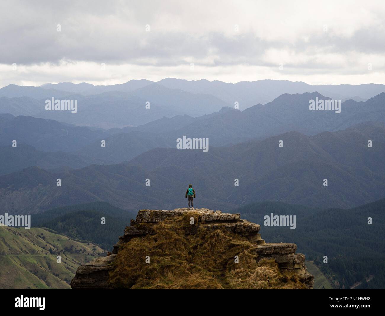 Lone hiker enjoying backcountry nature landscape mountain hills ...