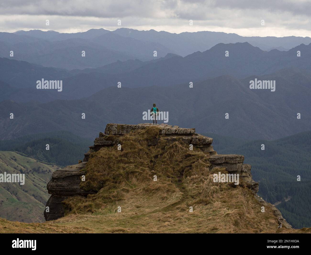Lone hiker enjoying backcountry nature landscape mountain hills ...