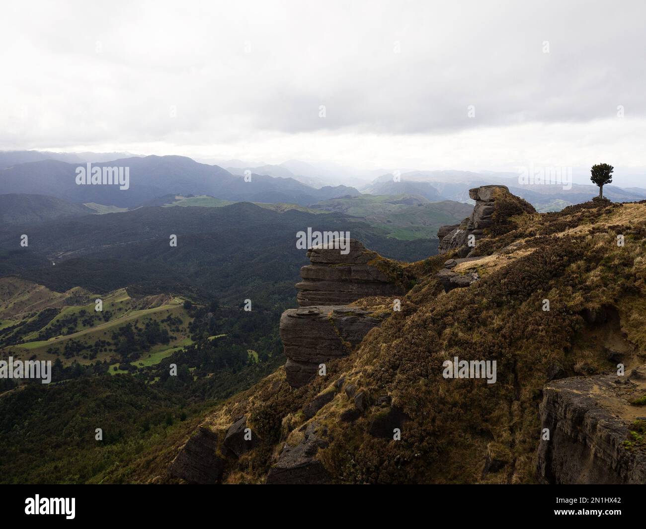 Backcountry nature landscape panorama with grass covered mountain hills ...
