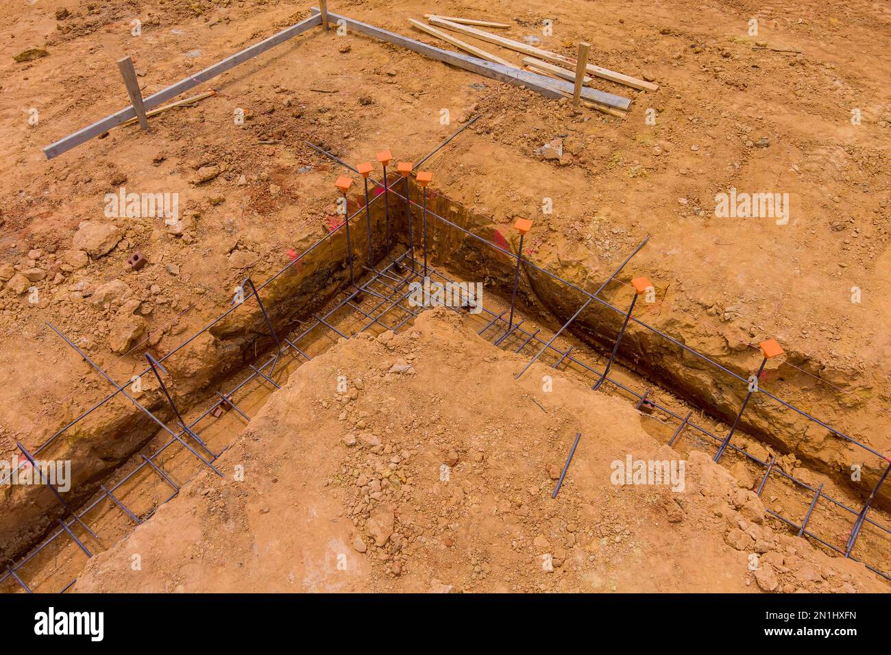 Building cement strip foundation fornew home digging trenches for ...